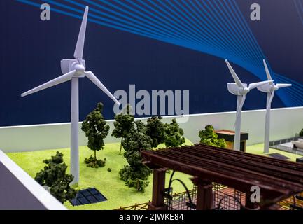 Windmills on the layout of a small wind farm Stock Photo - Alamy