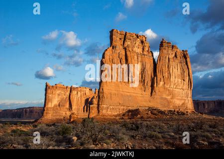 The Organ, a sandstone monolith in the Courthouse Towers, reflected in ...