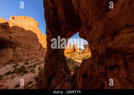 The back side of Double Arch framed by Cove Arch in the Cove of Caves ...
