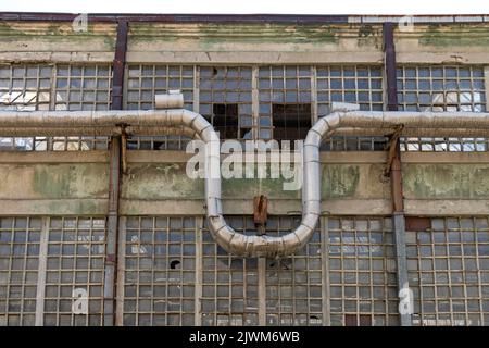 U Shape Bend at Steam Pipe Line in Old Factory Stock Photo - Alamy