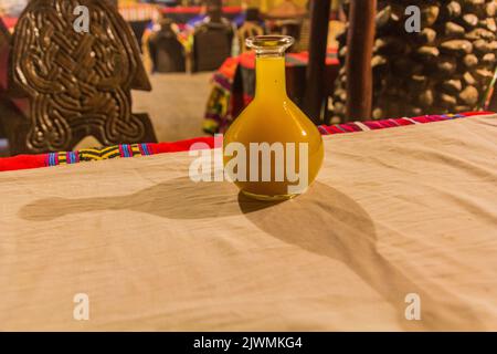 Tej (local honey wine) in traditional glasses, Ethiopia Stock Photo - Alamy