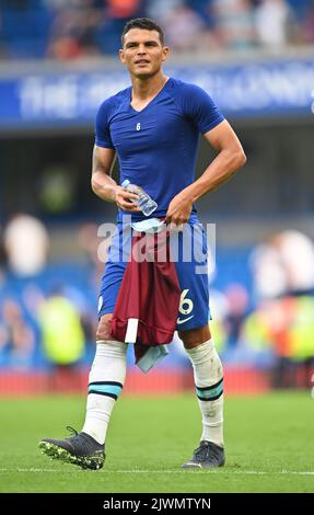 Chelsea's Thiago Silva and West Ham United's Mark Noble (right) battle ...
