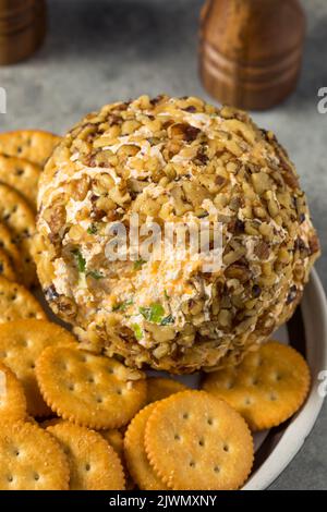 Homemade Creamy Cheese Ball Appetizer with Crackers Stock Photo - Alamy