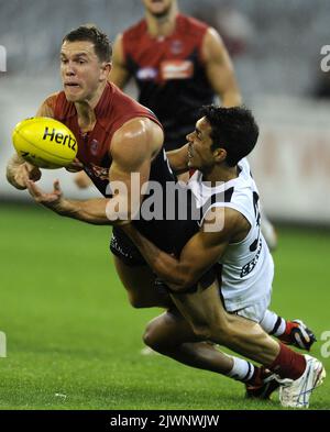 Terry Milera of St Kilda tackles David Swallow of the Gold Coast Suns ...