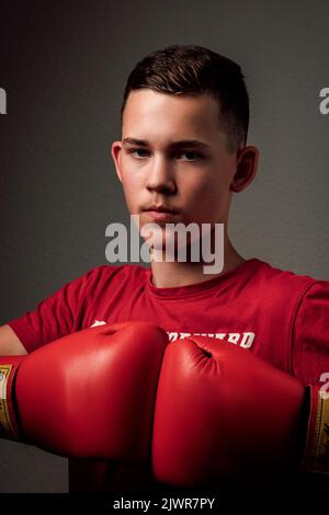 Young boxer sportsman in red sport suit Stock Photo - Alamy