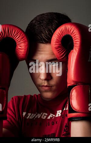 Young boxer sportsman in red sport suit Stock Photo - Alamy