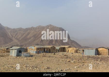 Simple huts of an Afar tribe settlement, Ethiopia Stock Photo - Alamy