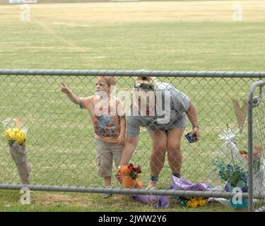 Locals pay tribute at the Tyabb Football & Cricket Club after the death ...