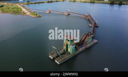 floating bucket excavator in quarry for sand Czech republic Podebrady ...