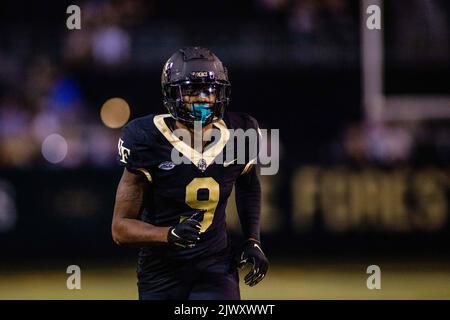 Wake Forest wide receiver A.T. Perry (9) warms up before an NCAA ...