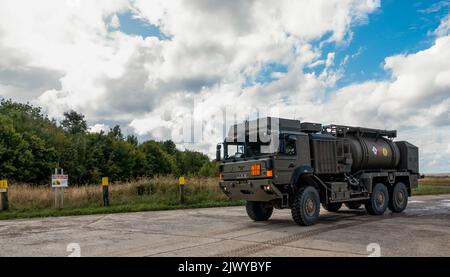 British army M.A.N. unit support tanker in action on a military ...