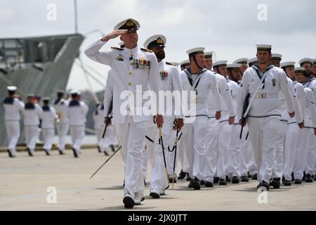 Commanding Officer Lieutenant Commander David Murphy salutes to the ...
