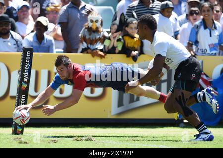 Arthur Retiere of France scores despite the efforts of Amenoni ...