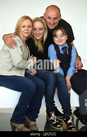 Alyssa Azar and her father Glenn, pose for a photo after arriving in ...