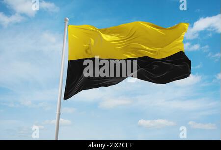 flag of Austronesian peoples Banjar people at cloudy sky background ...