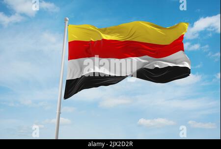 flag of Austronesian peoples Butonese people at cloudy sky background ...