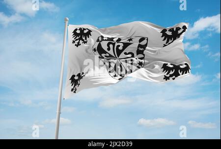 flag of Austronesian peoples Ilocano people at cloudy sky background ...