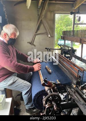 Balallan, UK. 09th Aug, 2022. Various fabrics are stacked on top of ...