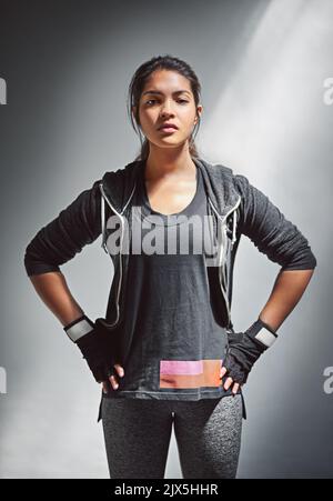 Hourglass on the gray background Stock Photo - Alamy