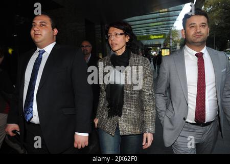 Eman Sharobeem (centre) departs after giving evidence at the NSW ...