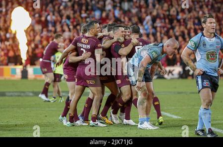 Maroons players celebrate their win at full time of State of Origin ...