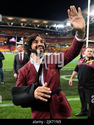 Maroon legend Johnathan Thurston waves to cheering fans after the ...