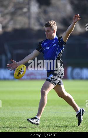 Cameron Zurhaar of the Kangaroos kicks on goal during the Round 19 AFL ...