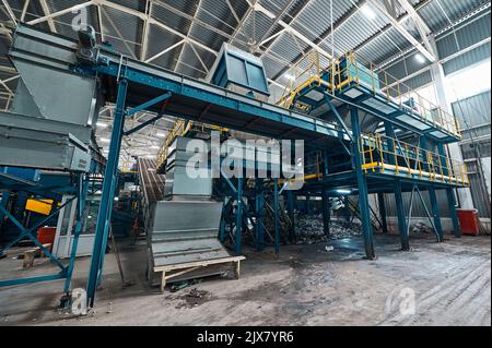 Large production line with conveyors carrying trash at plant Stock Photo - Alamy