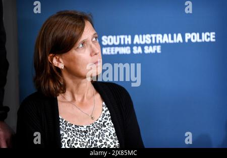 Andrea Ebert, mother of Tanja Ebert, listens as a statement is read at ...