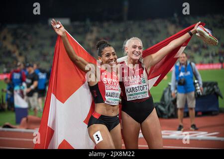 Mujinga Kambundji ,Ida Karstoft with her country's flag at the European ...
