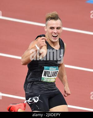 Trae Williams of Queensland celebrates after winning the mens 100 ...