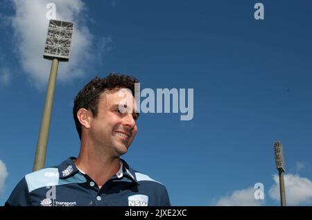 Test Cricketer Ed Cowan poses for a photograph after announcing his ...
