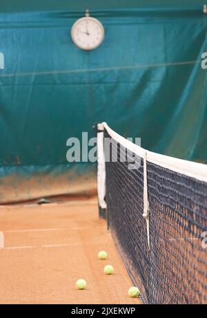 Tennis Ball over Net Stock Photo - Alamy