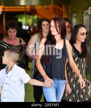 Family and friends of Peter Andrew Scott are seen outside the District ...