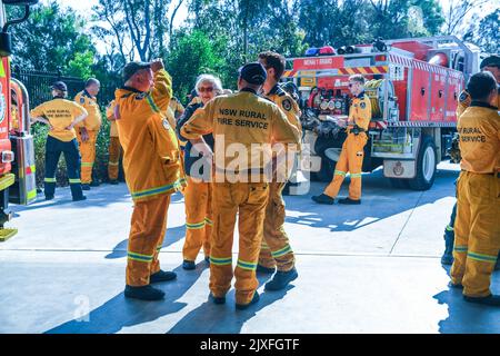 Volunteer fire fighters are seen on duty at Menai Rural Fire Service ...