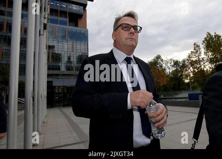 CBA banker Brett Perry leaves the Royal Commission into Misconduct in ...