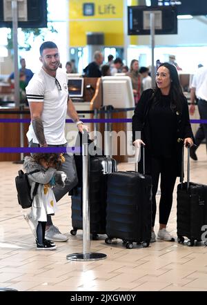 Brisbane Broncos captain Darius Boyd is seen with his wife Kayla and ...