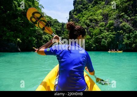Palawan, Philippines, Tourists Kayaking and Exploring the Natural ...