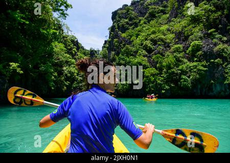 Palawan, Philippines, Tourists Kayaking and Exploring the Natural ...