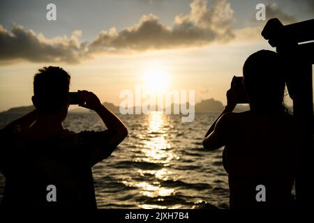 Beautiful scenery of cliffs by the sea at sunse Stock Photo - Alamy