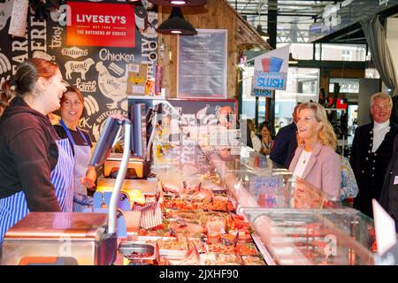 The Earl of Wessex talks to a local butcher during a visit to Preston ...