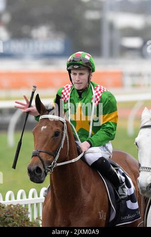 Jockey Sam Weatherly rides Za Zi Ba to victory in race 4, the Lindt ...