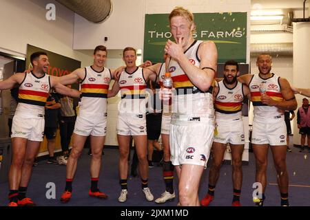 Elliott Himmelberg of the Crows is doused with Gatorade whilst the ...