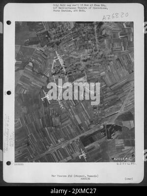 B-24 Liberators of the 98th Bomb Group bomb the Otopeni airdrome on 26 ...