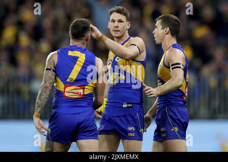 Jack Redden (centre) of the Eagles is congratulated by teammates during ...