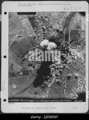 Smoke billows up from the marshalling yards at Ploesti, Rumania during ...