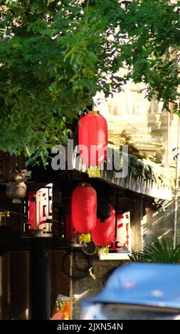 A vertical shot of lanterns in Huanglongxi Ancient Town, Shuangliu ...