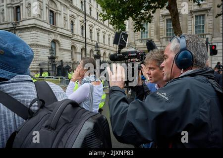 Nick Watt, BBC Political Editor, presenting to Camera in Whitehall on ...