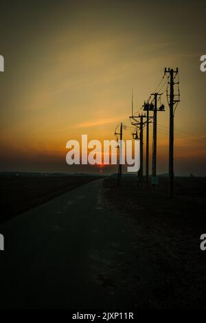Blackout, power poles in the dark sky, power cut - no electricity, the ...