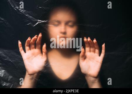 peaceful woman defocused art portrait isolation Stock Photo - Alamy